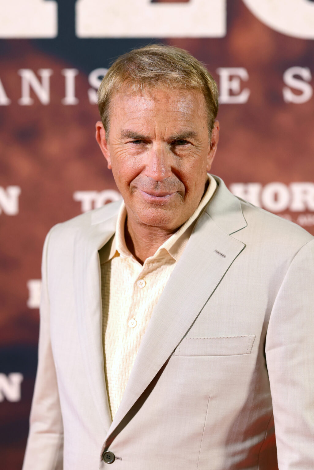 At 69, Kevin Costner shocks fans after debuting "orange" hair at Venice ...